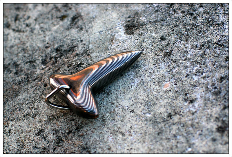 Shark tooth (mokume) and "Lightning Bolt" (damascus) pendants ...